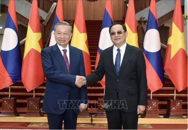 President To Lam meets Lao Prime Minister Sonexay Siphandone - VnEconomy